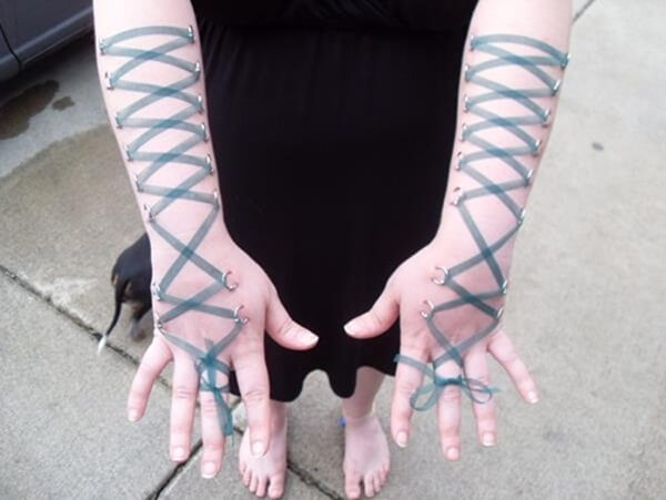 70 Best Corset Piercing Ideas to Try out - Border Tattoo