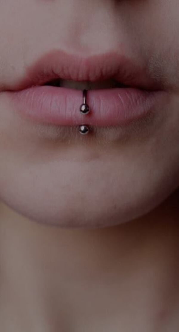 90 Ideas to Embellish Your Lips With Labret Piercings - Border Tattoo