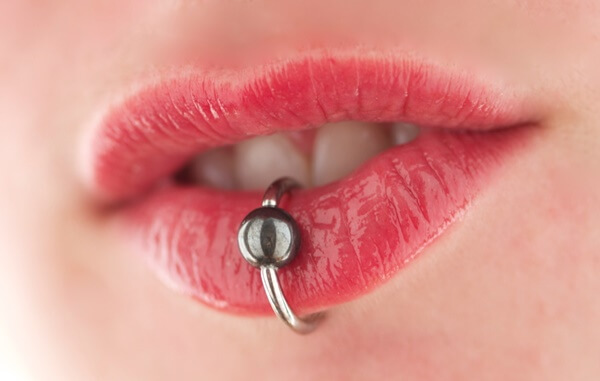 90 Ideas to Embellish Your Lips With Labret Piercings - Border Tattoo